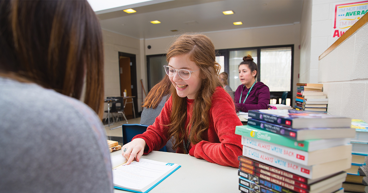 As reading mentors and role models, students connect with at-risk youths